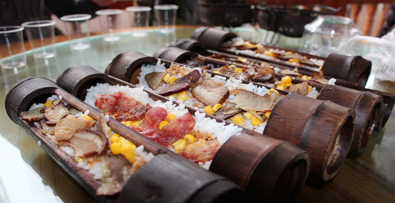 Rice Cooked in Bamboo Tubes-Best china Tours service_chinatoursnet.com
